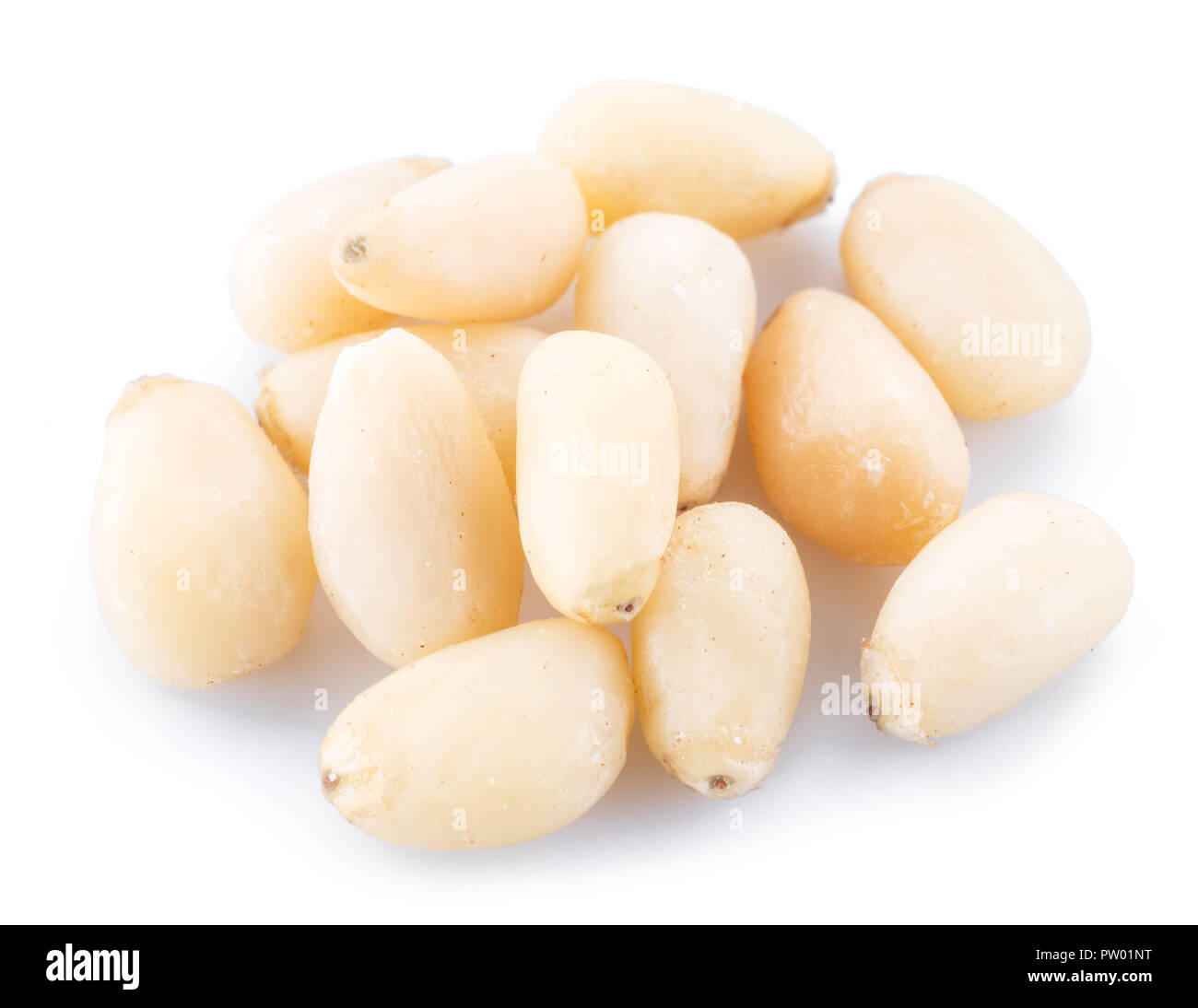 Pine nuts on the white background. Organic food Stock Photo - Alamy