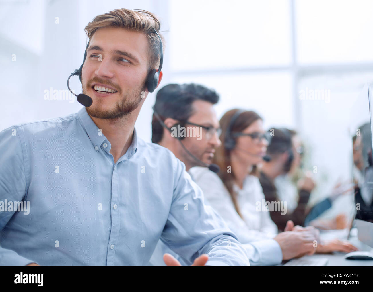 Business customer support guy smiling hi-res stock photography and ...