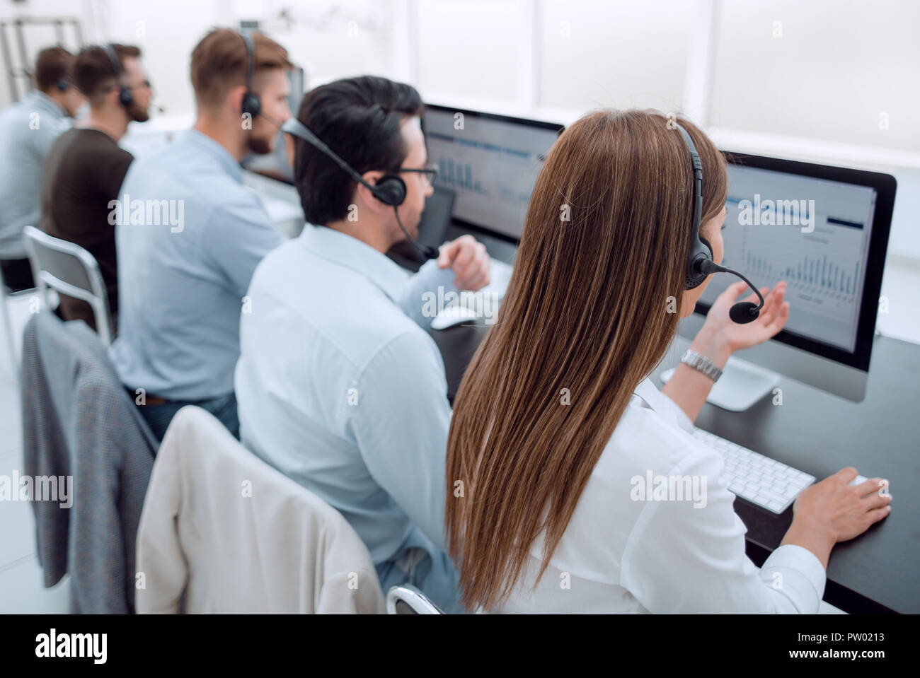 group of call center employees work with clients Stock Photo - Alamy
