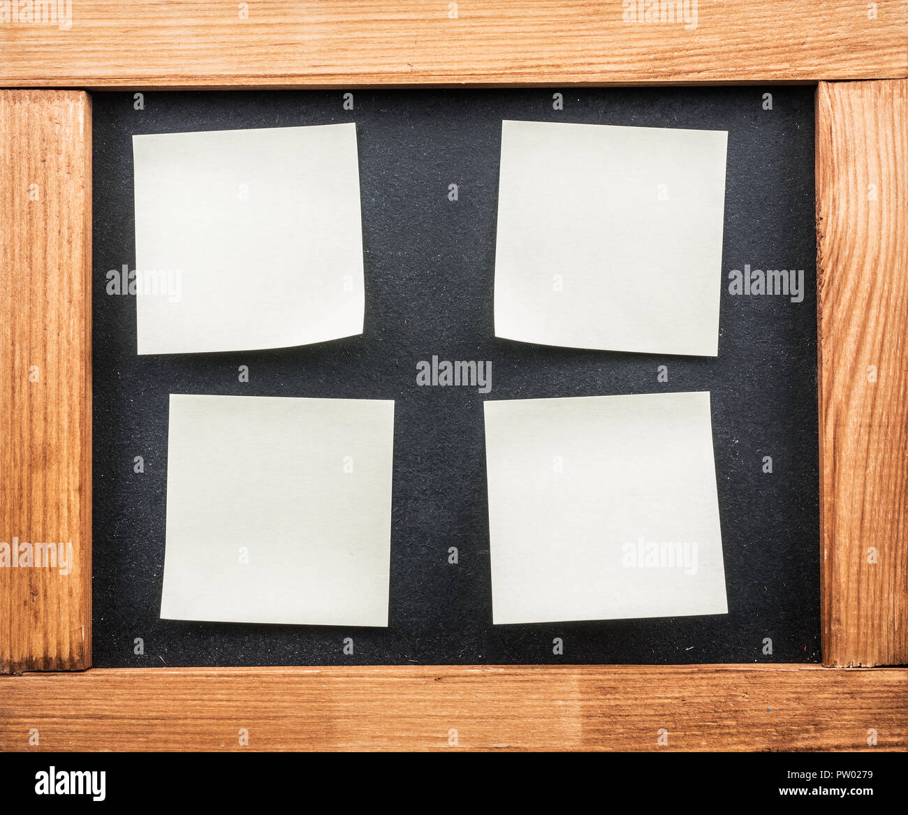 Blackboard and post-it notes stuck to the front Stock Photo - Alamy