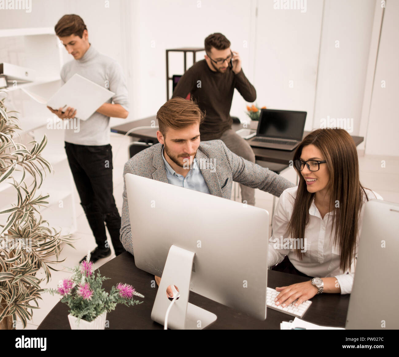 group of employees works in a modern office Stock Photo - Alamy