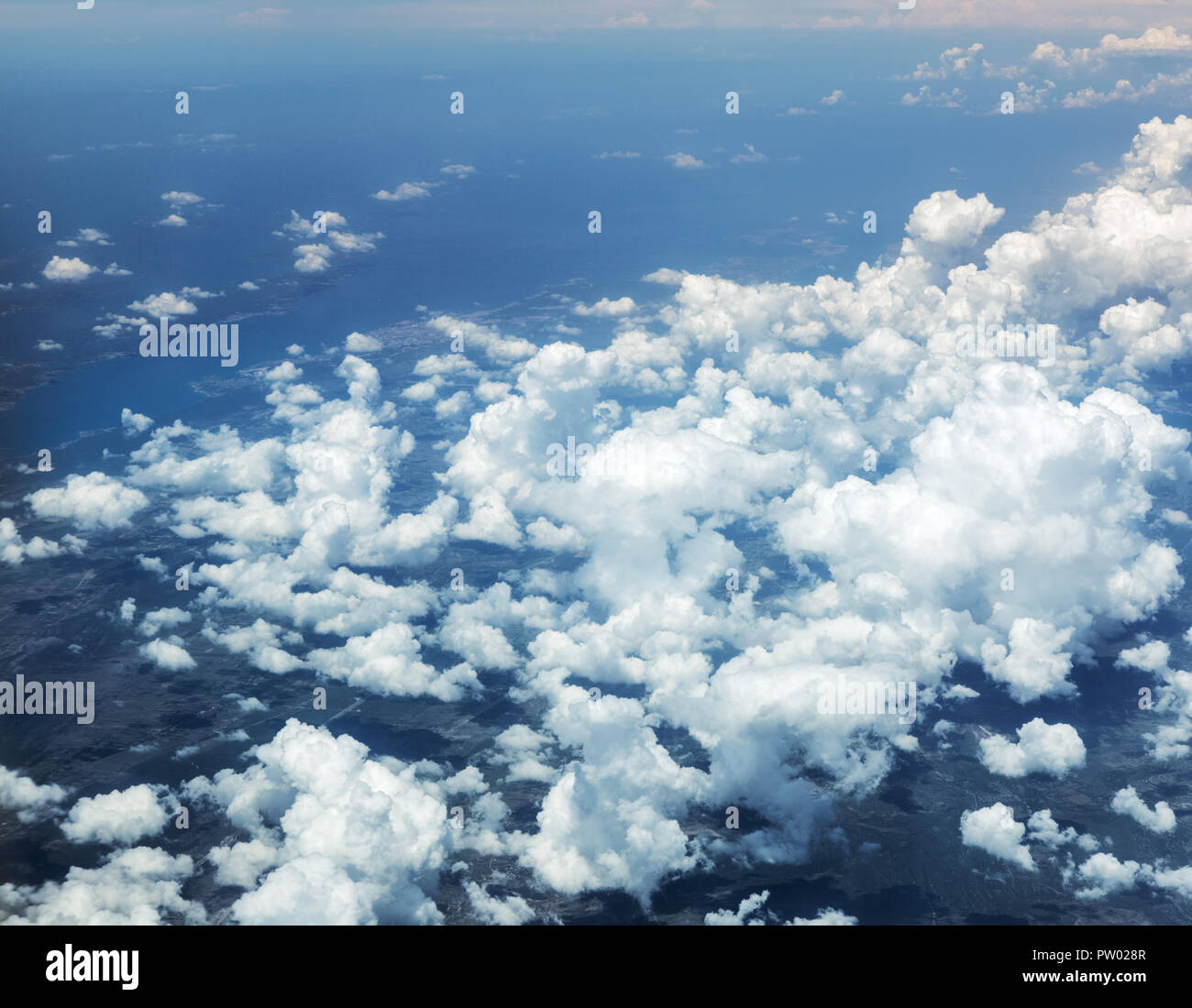Aerial view of clouds and landscape under them Stock Photo - Alamy