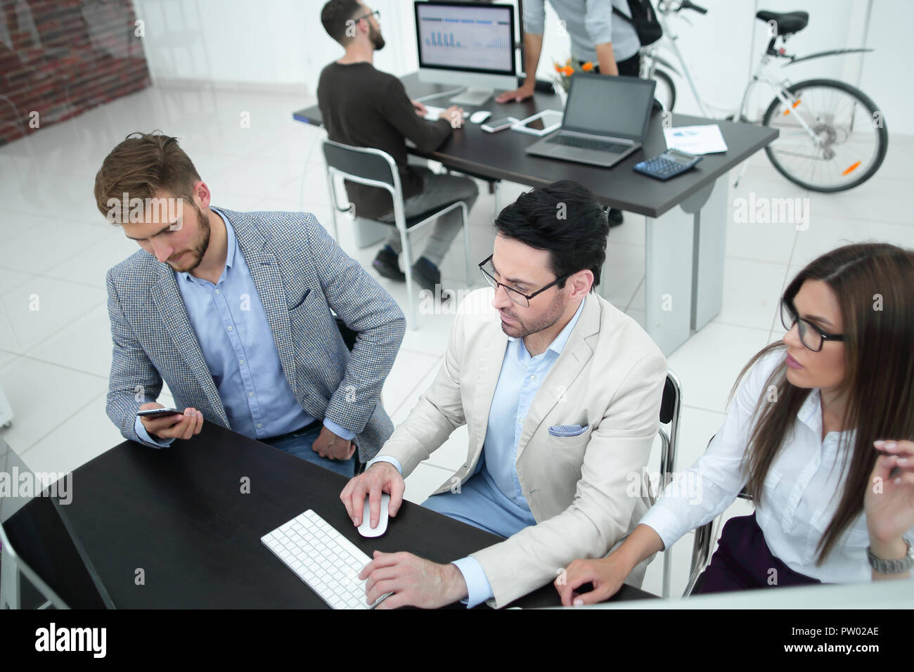 employees in the workplace in a modern office Stock Photo - Alamy