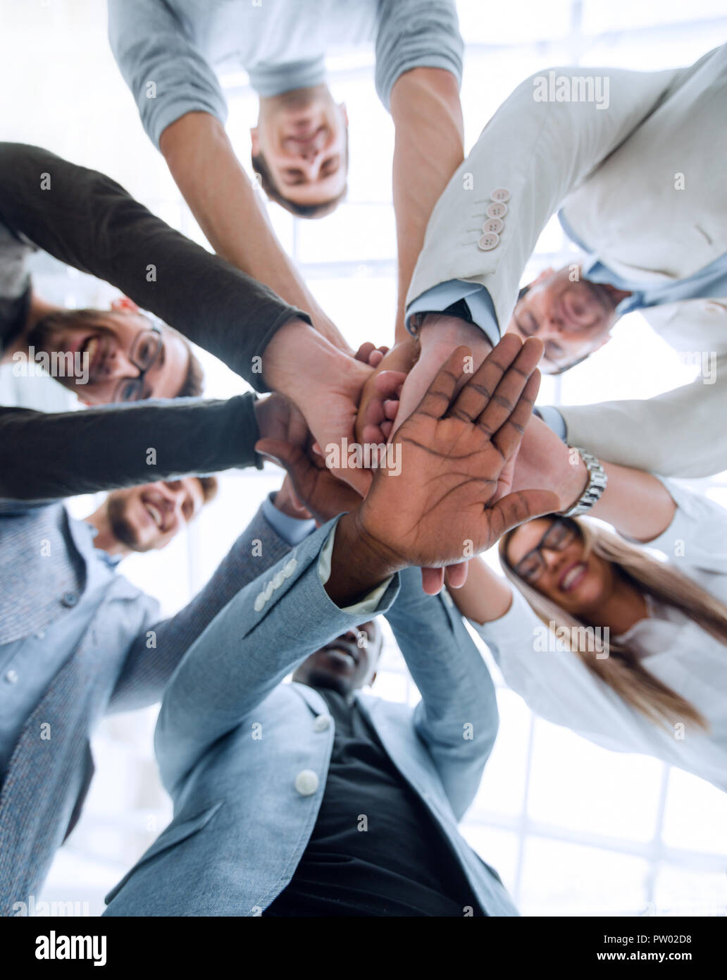 business background.business team making a stack of hands Stock Photo ...