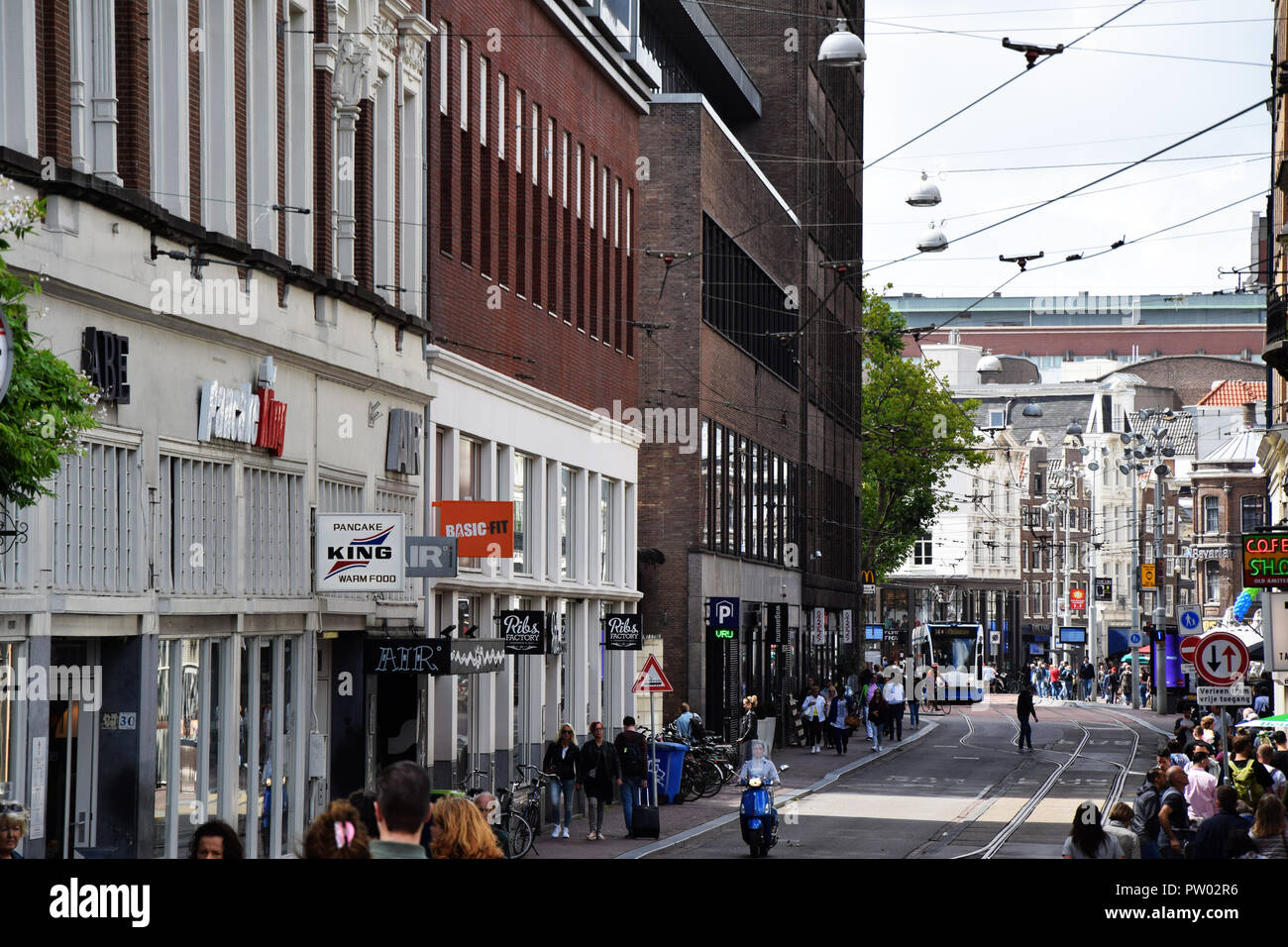 Busy street in Amsterdam, Holland, Netherlands Stock Photo - Alamy
