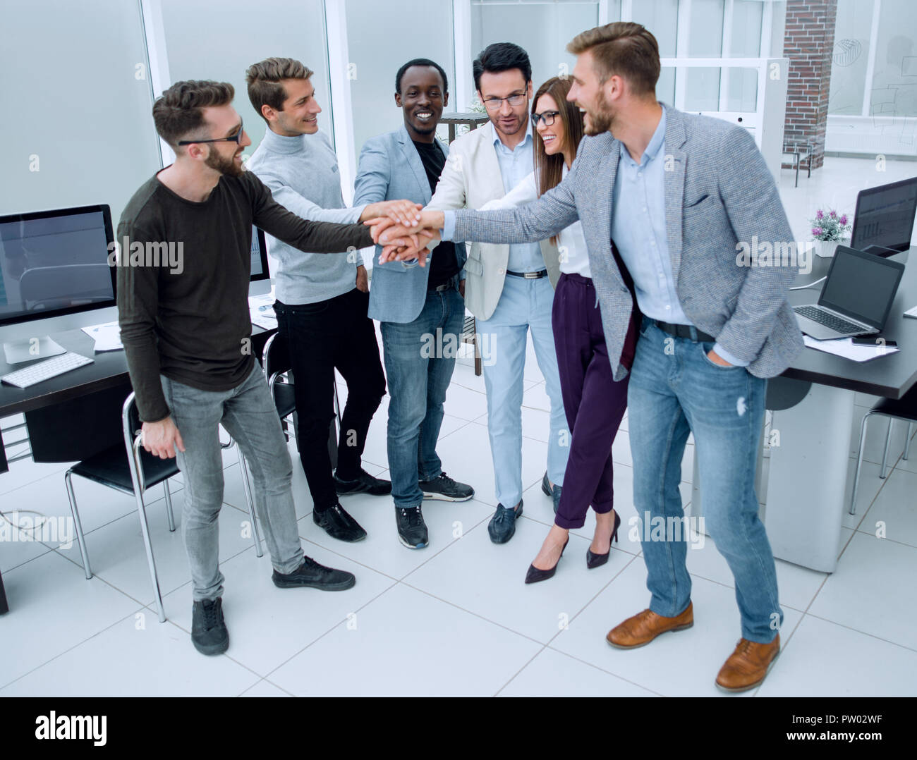 professional business team showing their unity Stock Photo - Alamy