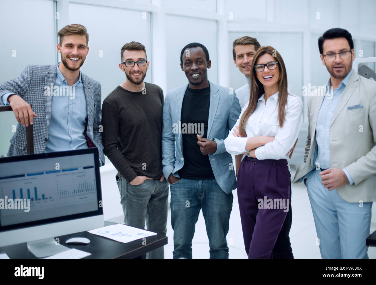 Employees checking together documents hi-res stock photography and ...