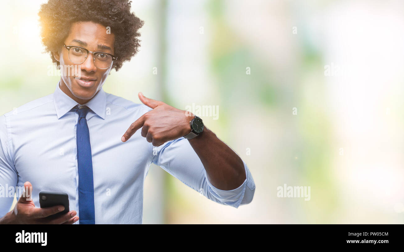 Afro american business man texting using smartphone over isolated ...