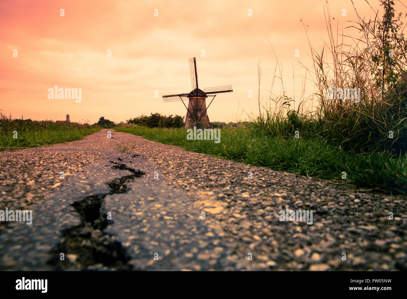 Beautiful Dutch windmills at sunset from Holland Stock Photo - Alamy