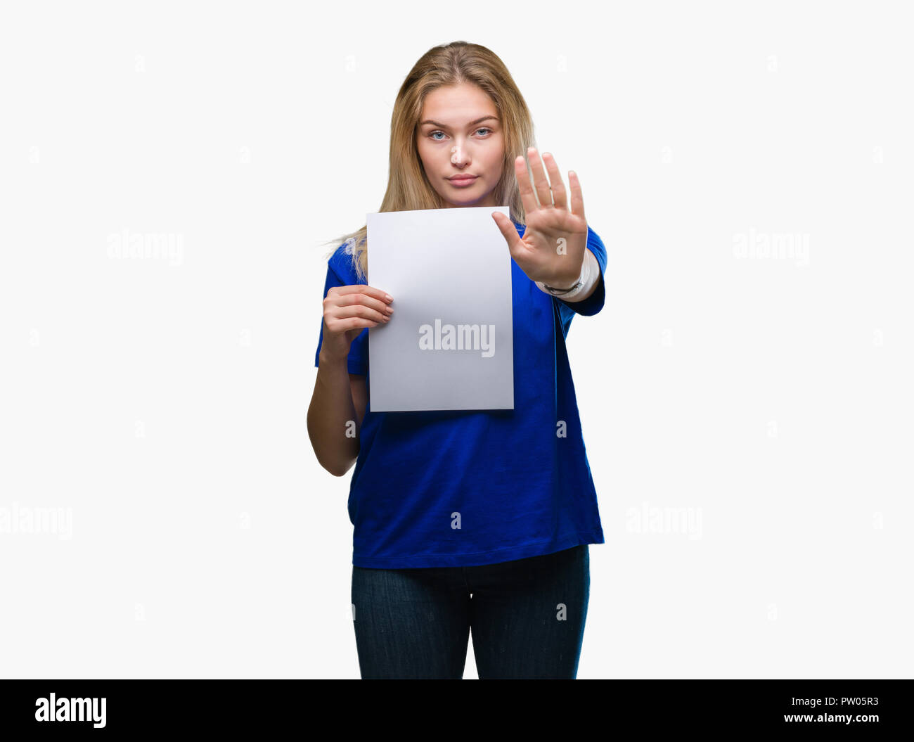Young caucasian woman holding blank paper sheet over isolated ...
