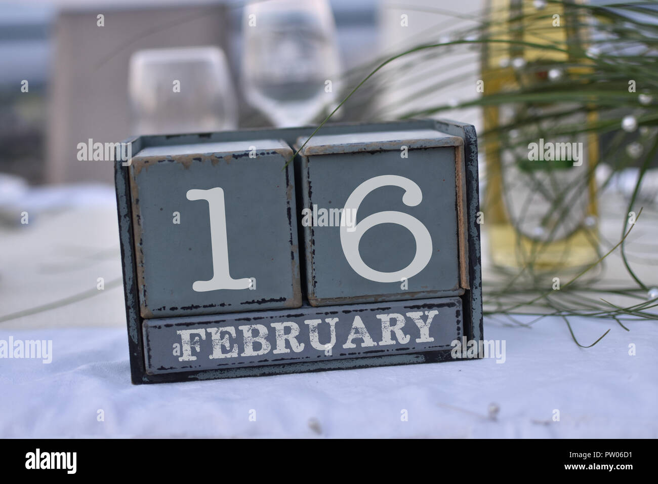 Wood blocks in box with date, day and month 16 February. Wooden blocks ...