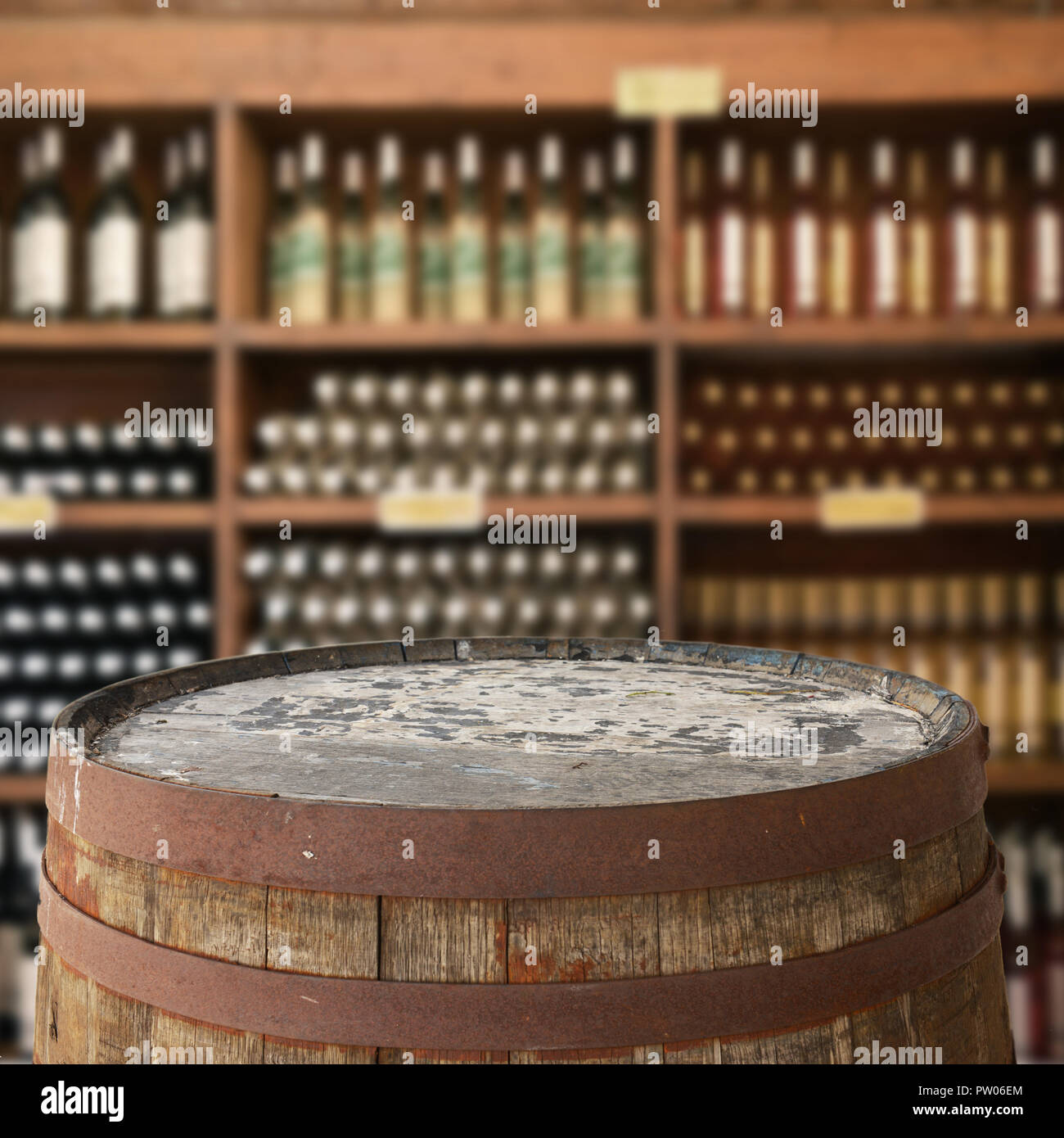 Old barrel top for display montages - shelf with wines in background ...