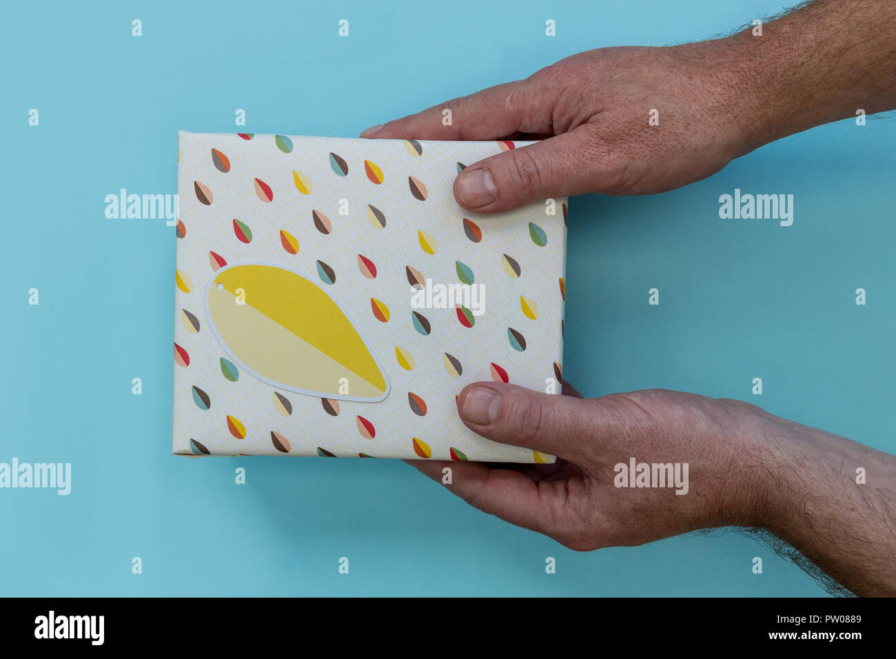 Hands giving receiving gift hi-res stock photography and images - Alamy