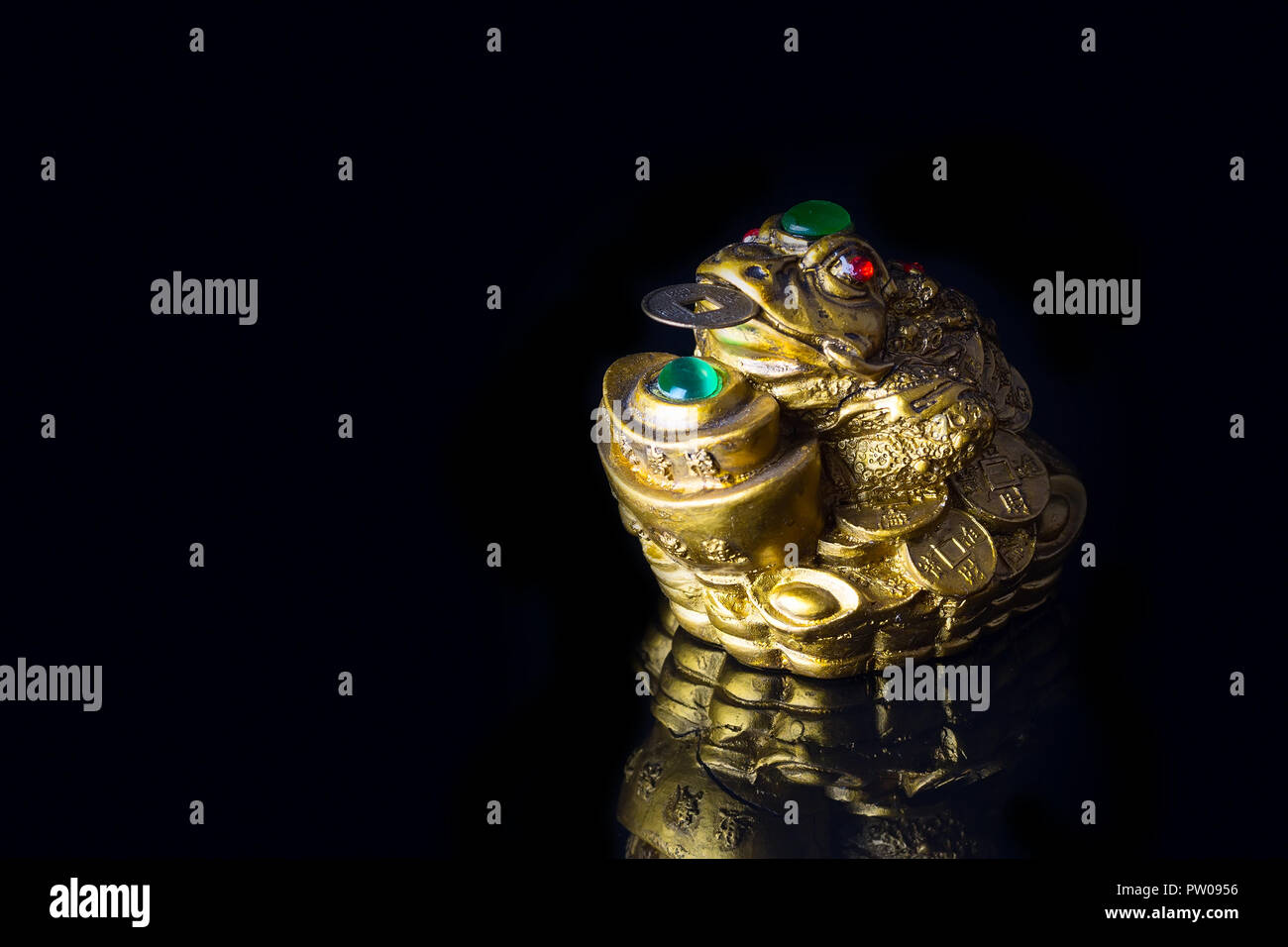 Close-up Chinese Money Frog with the coin symbolizing wealth and ...