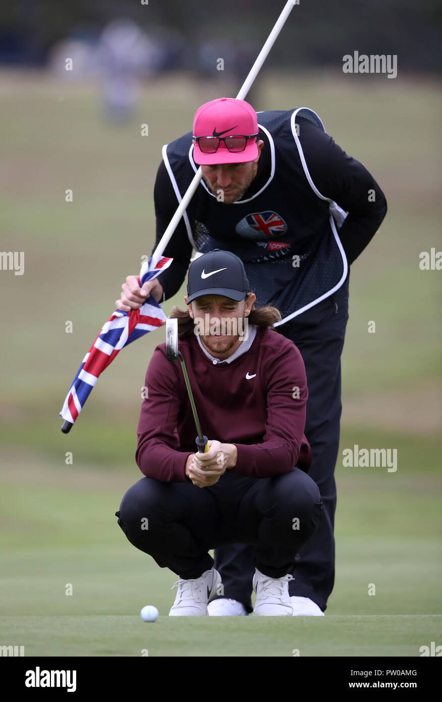 Tommy Fleetwood and caddy Ian Finnis during day one of the British ...