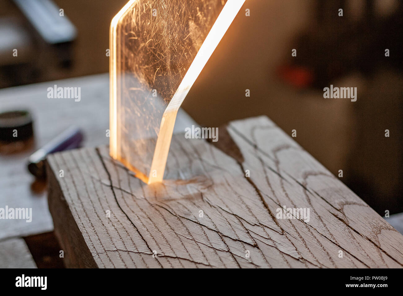 Glowing white shard, wood and glass lamp. Eco-friendly woodworker's ...