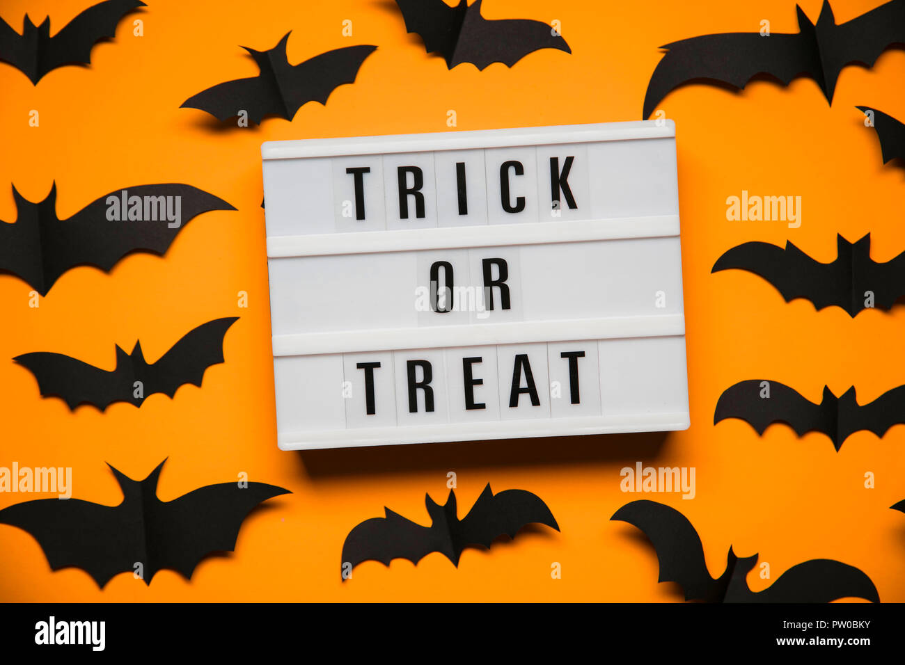 Trick or Treat halloween lightbox message with black scary bats Stock ...