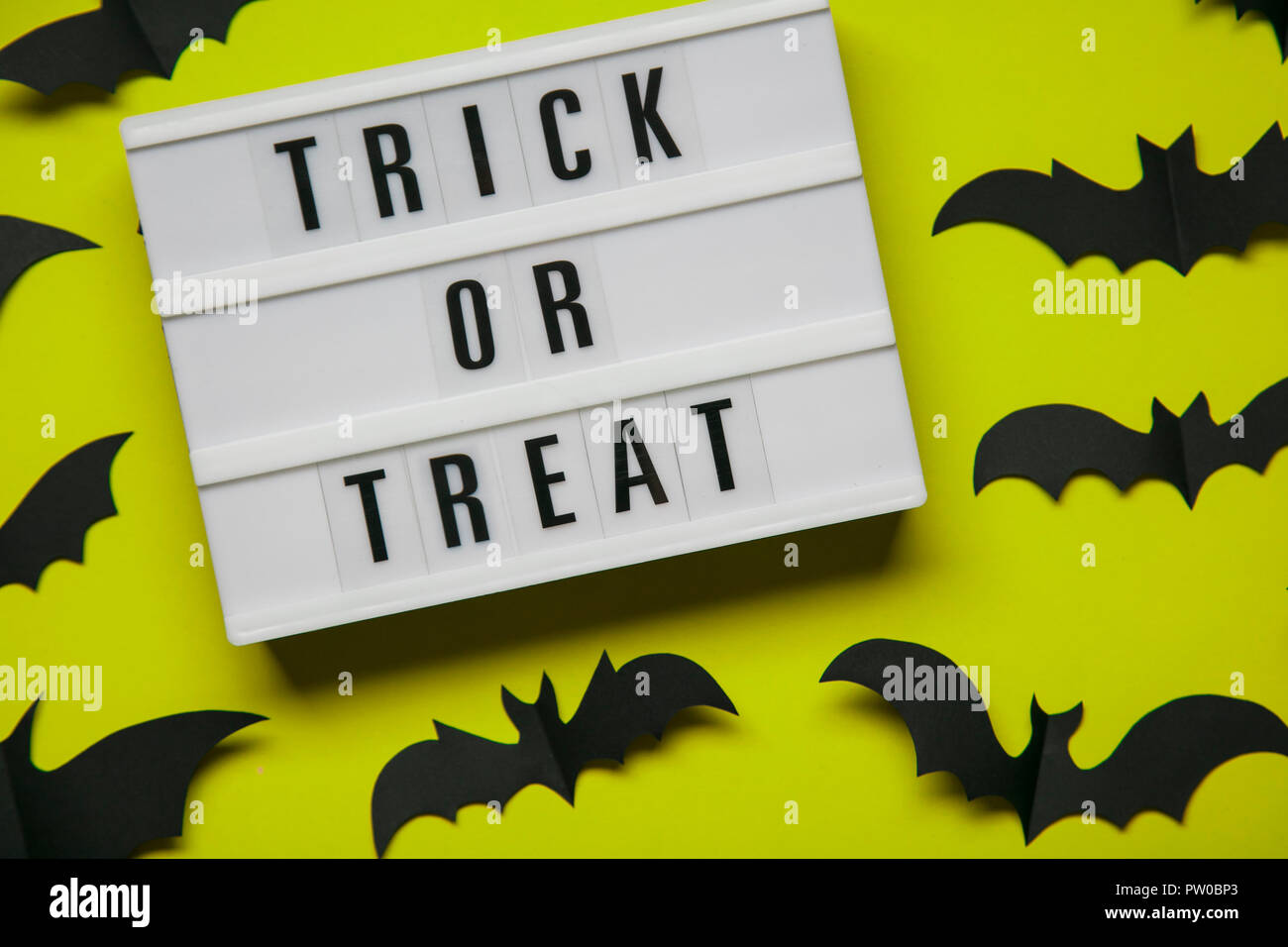 Trick or Treat halloween lightbox message with black scary bats Stock ...