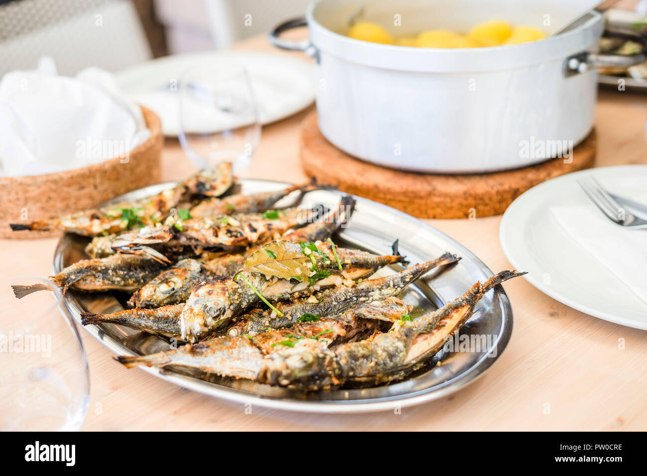 Silver tray full of delicious fish mackerel known as carapau in ...