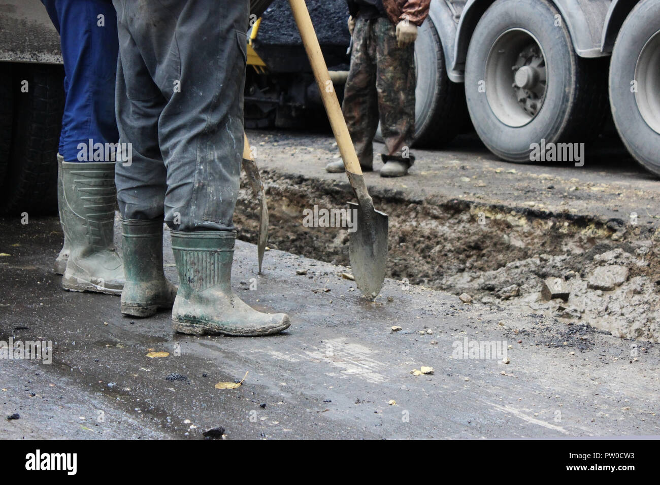 Tractor strong outrigger stabilizing legs extended to stabilize and ...