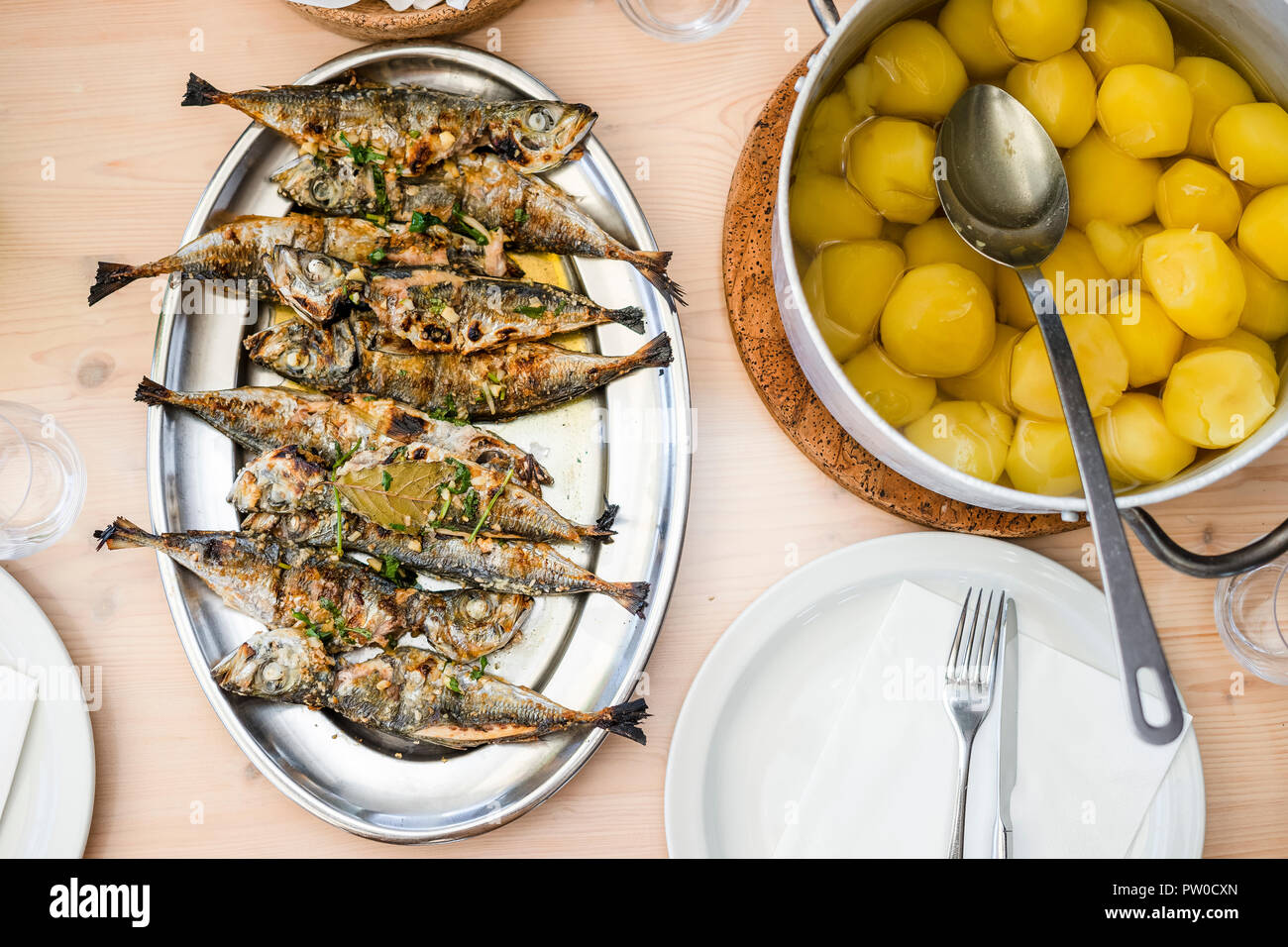 Silver tray full of delicious fish mackerel known as carapau in ...