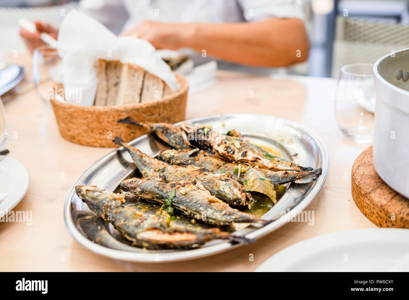 Silver tray full of delicious fish mackerel known as carapau in ...