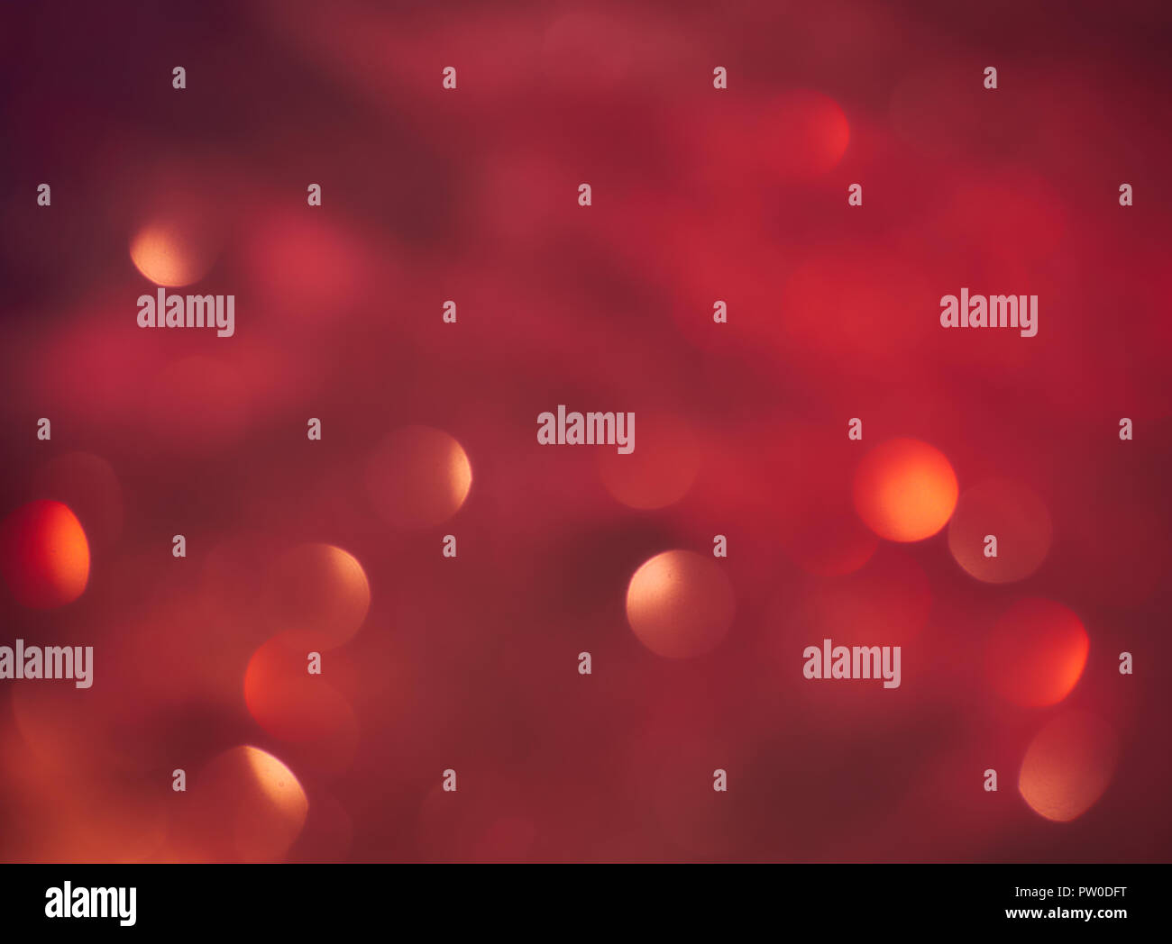 Red glitter lights background. defocused soft light. lens flare ...