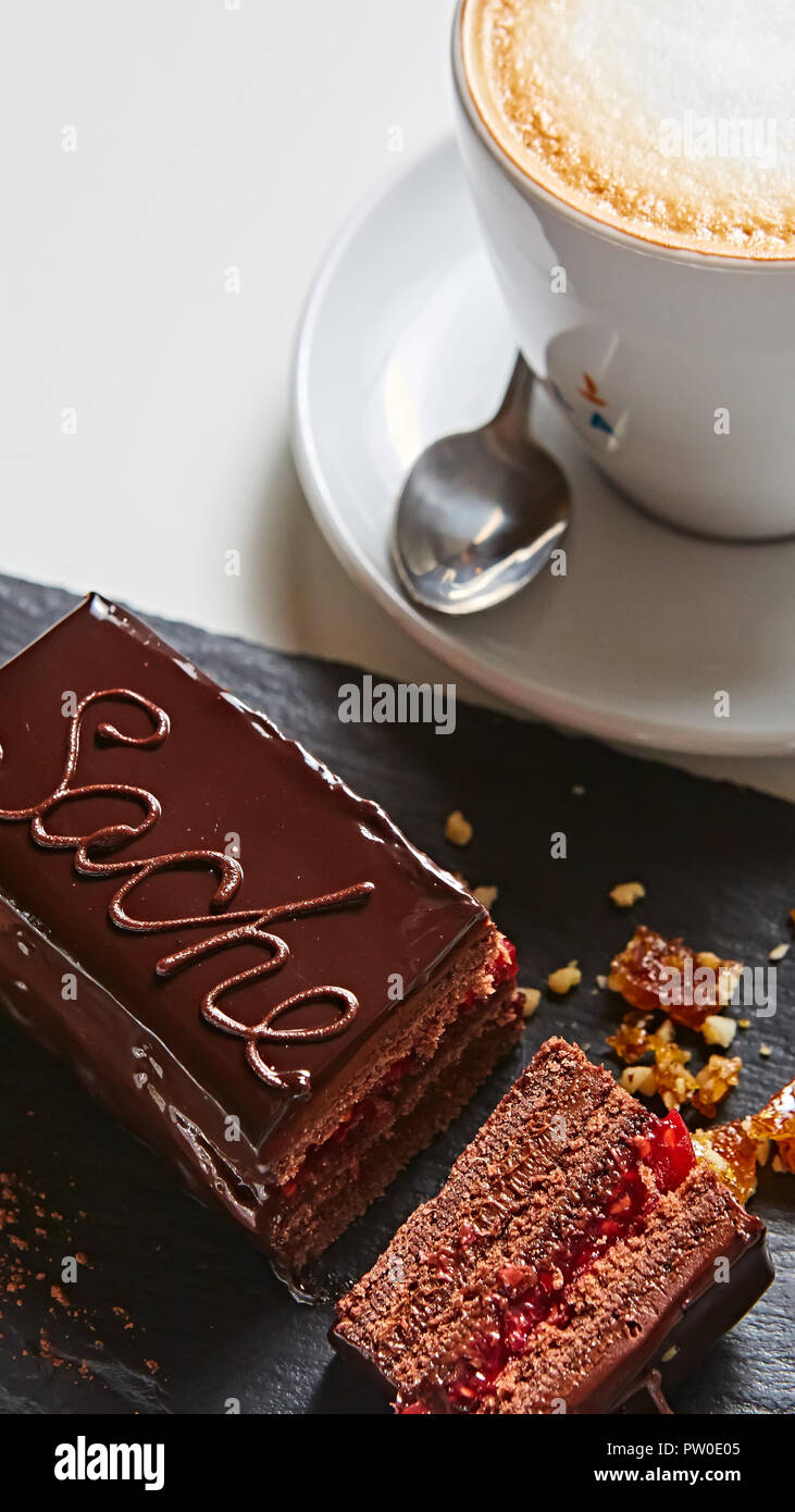 A piece of Sacher cake. Shallow dof Stock Photo - Alamy