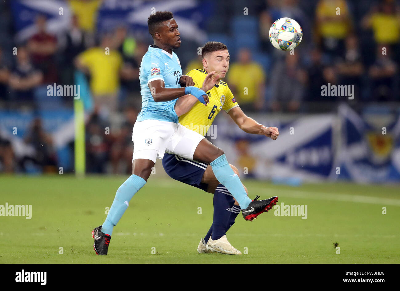 Israel's Taleb Tawatha (left) and Scotland's Kieran Tierney battle for ...