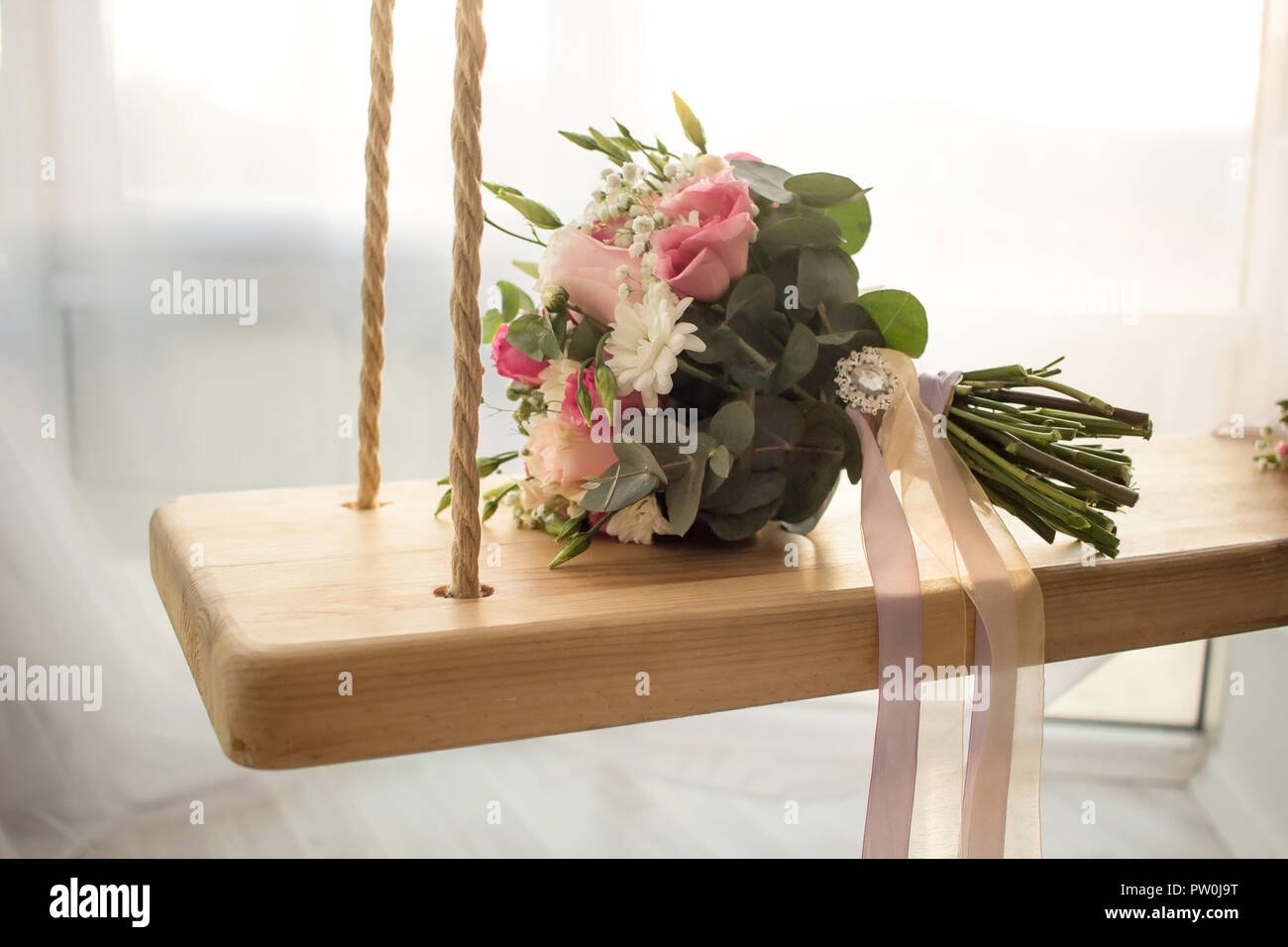 Wedding bouquet flowers on indoor romantic window wedding background ...