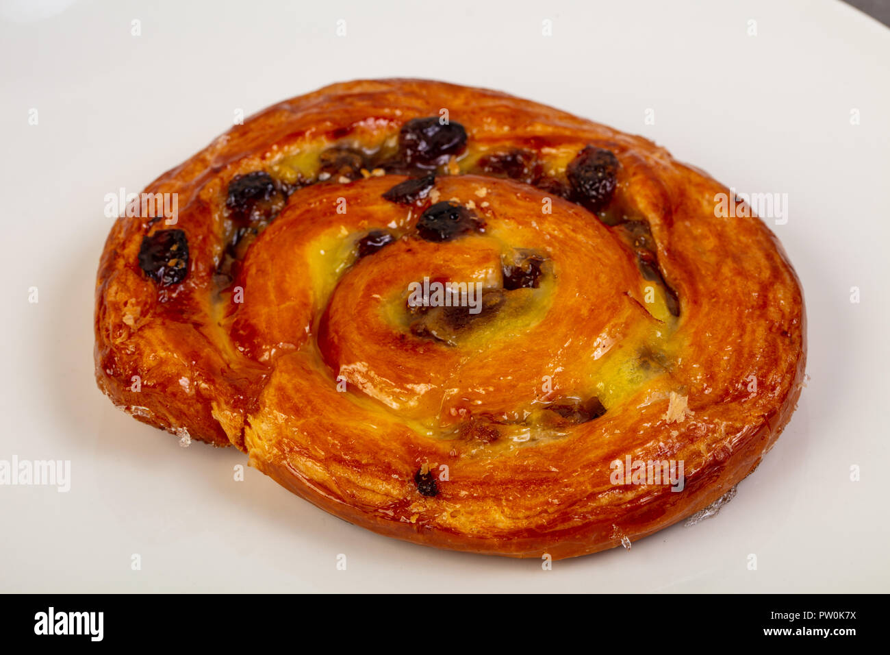 Baked snail with raisin and shugar Stock Photo - Alamy