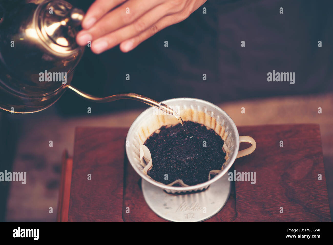 Barista brewing coffee, method pour over, drip coffee Stock Photo - Alamy