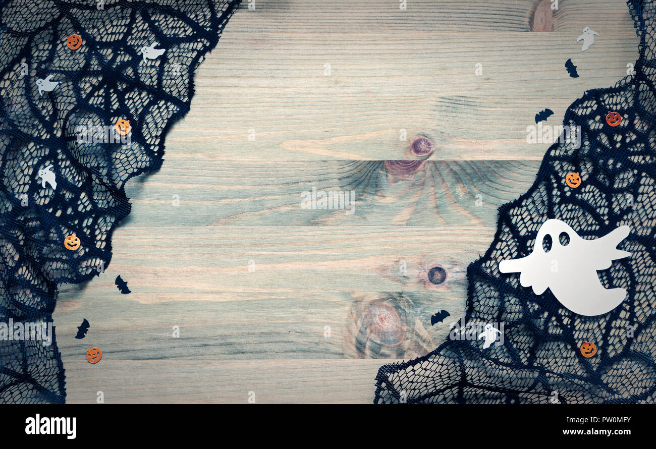 Halloween background. Spider web, cobweb lace and spooky ghosts ...