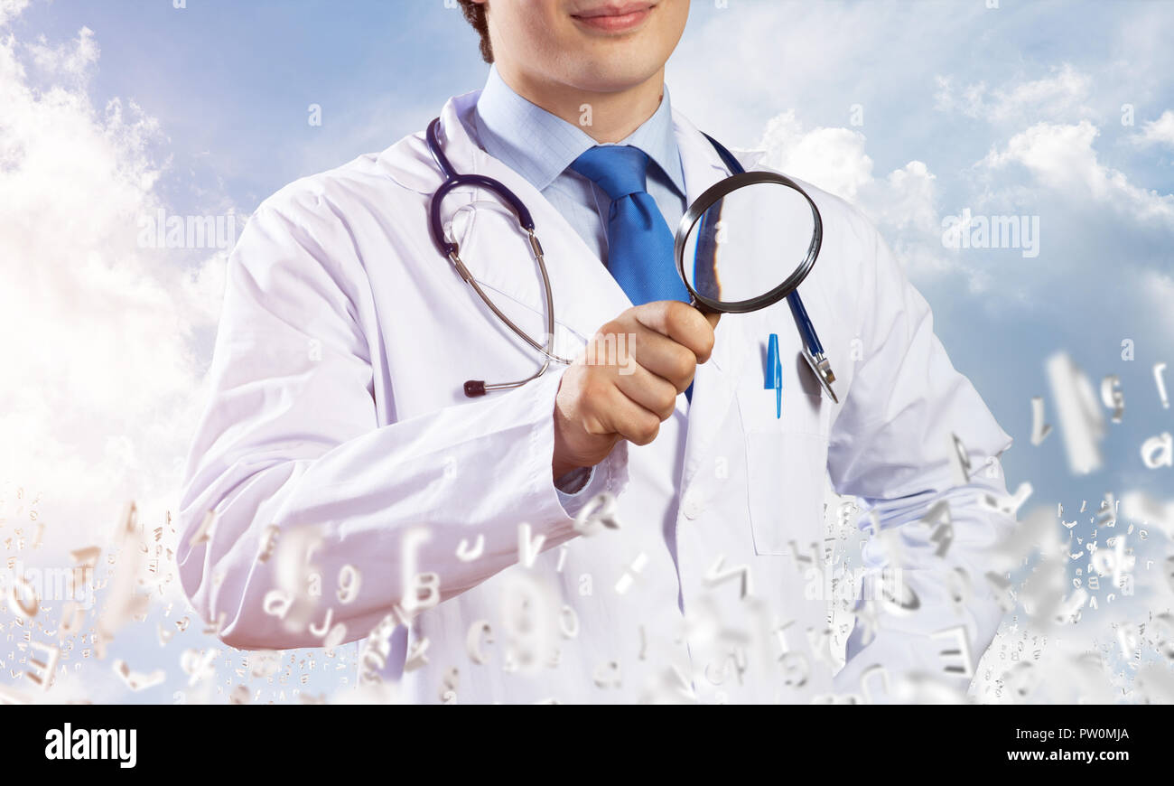 Doctor searching your diseases Stock Photo - Alamy