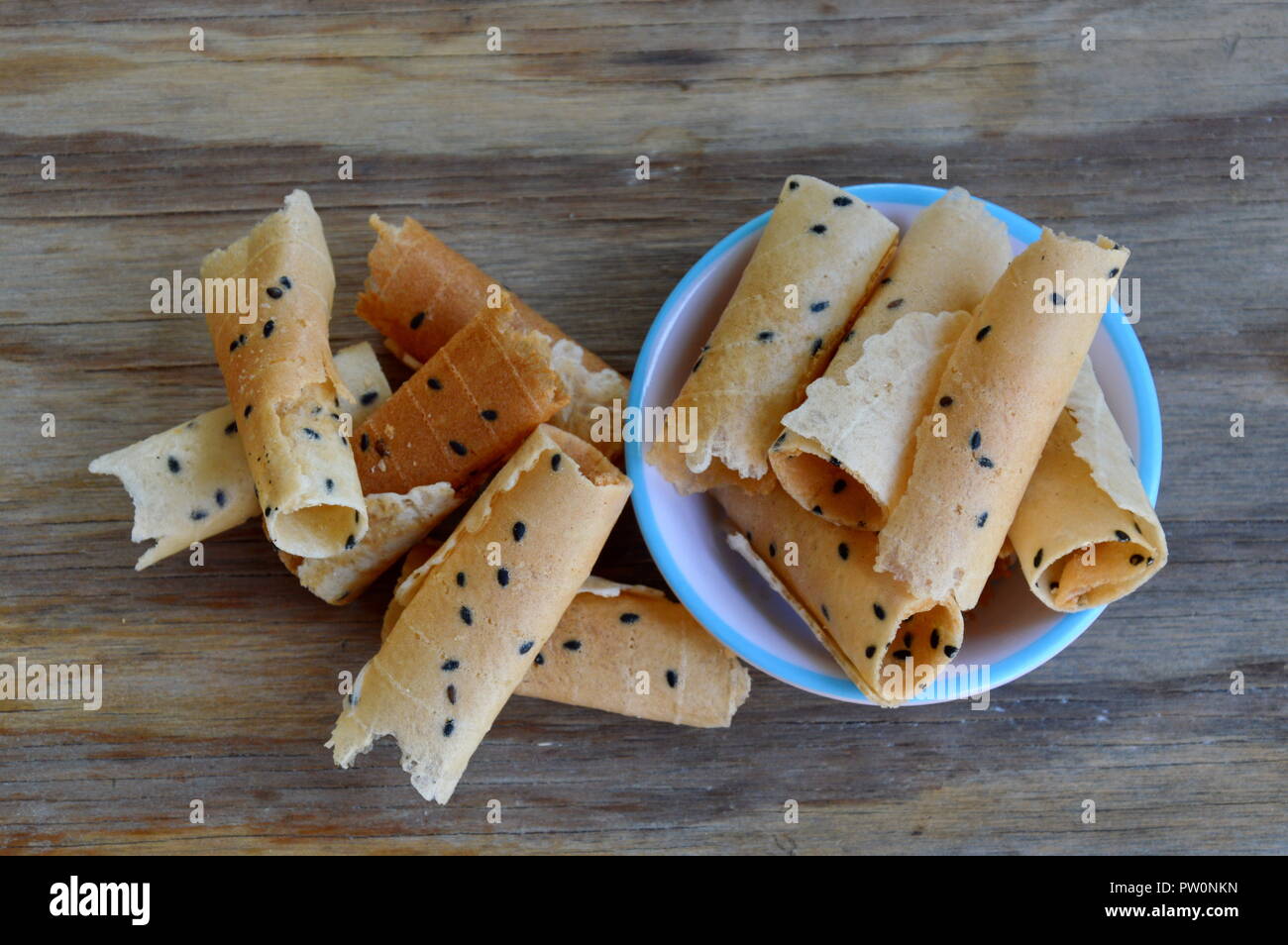 crispy rolled wafer traditional Thai dessert on cup Stock Photo - Alamy