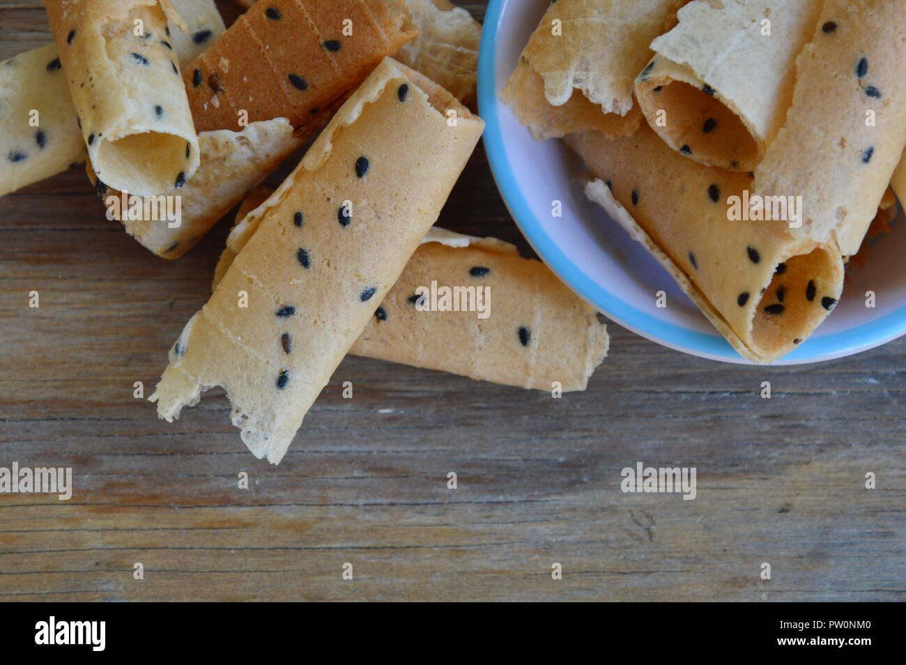 crispy rolled wafer traditional Thai dessert on cup Stock Photo - Alamy