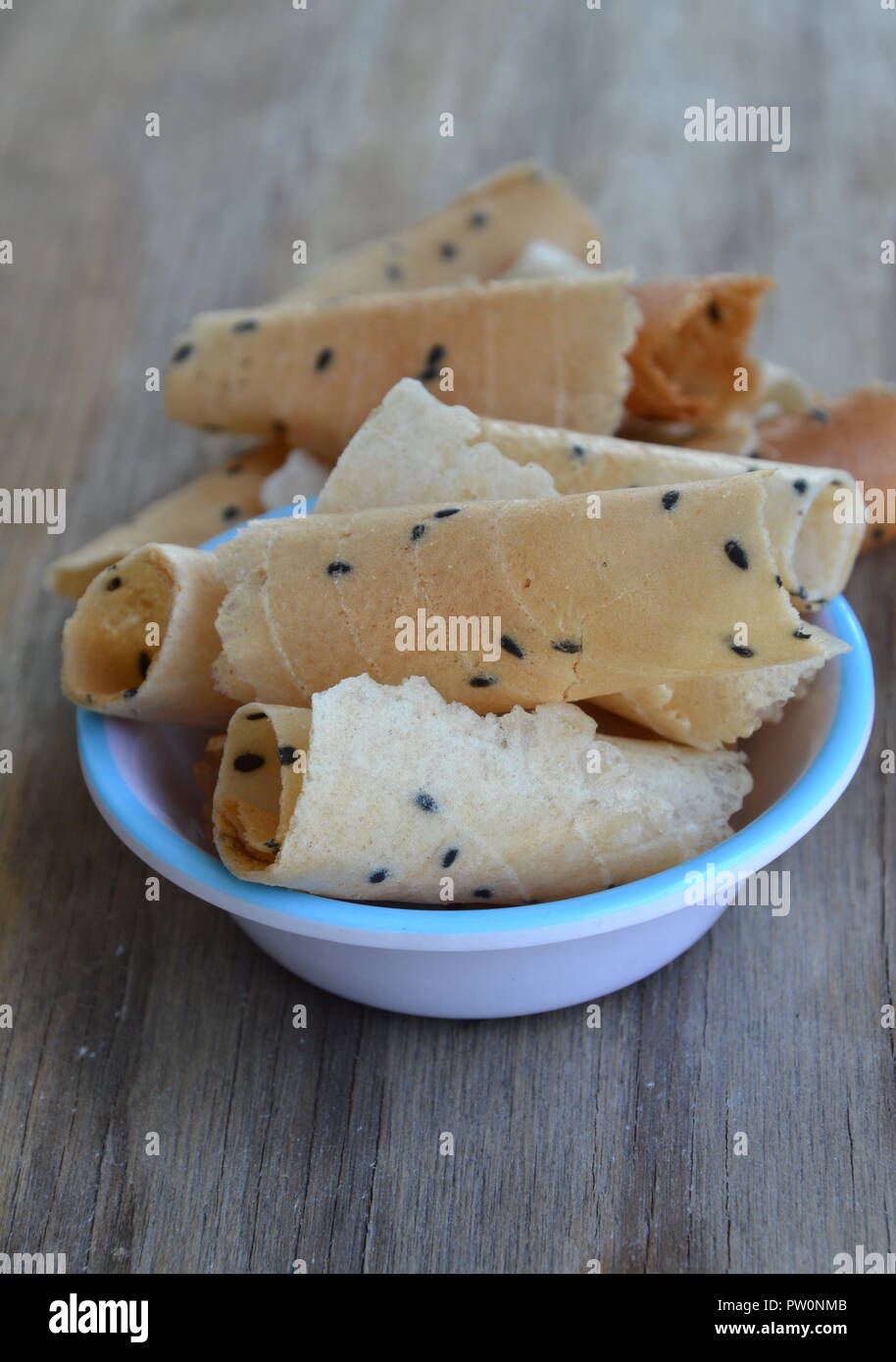 crispy rolled wafer traditional Thai dessert on cup Stock Photo - Alamy