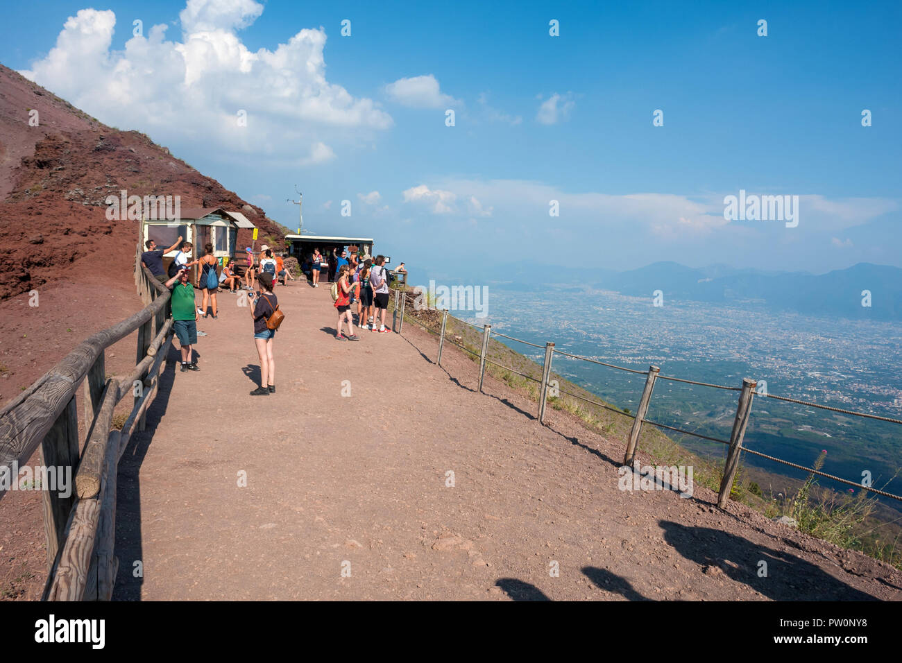 MOUNT VESUVIUS, ITALY - AUGUST 1, 2018: Tourists walk around the crater ...