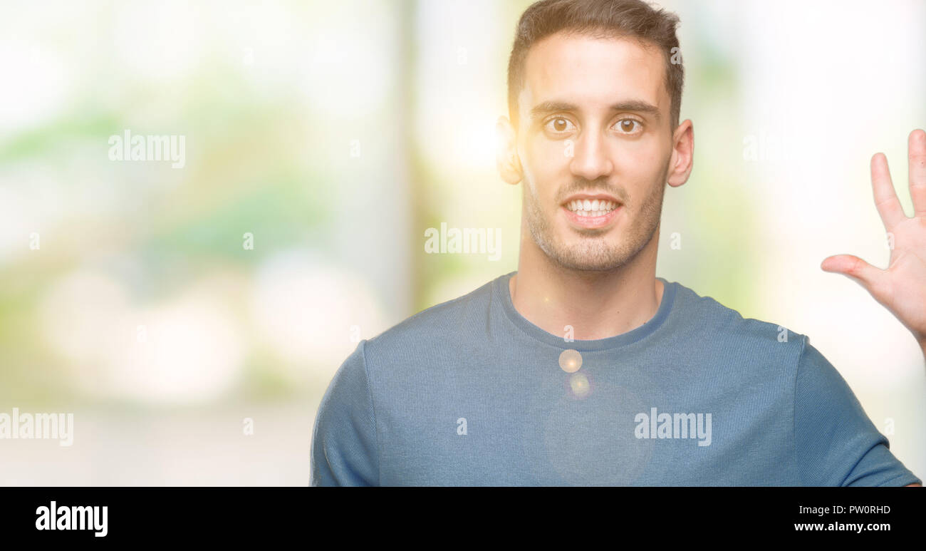 Guy showing five fingers hi-res stock photography and images - Alamy