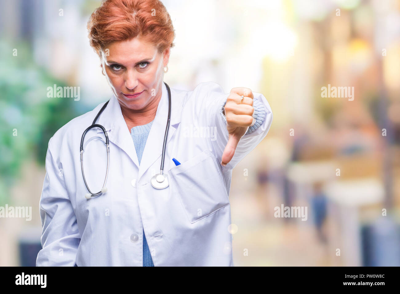 Senior caucasian doctor woman wearing medical uniform over isolated ...