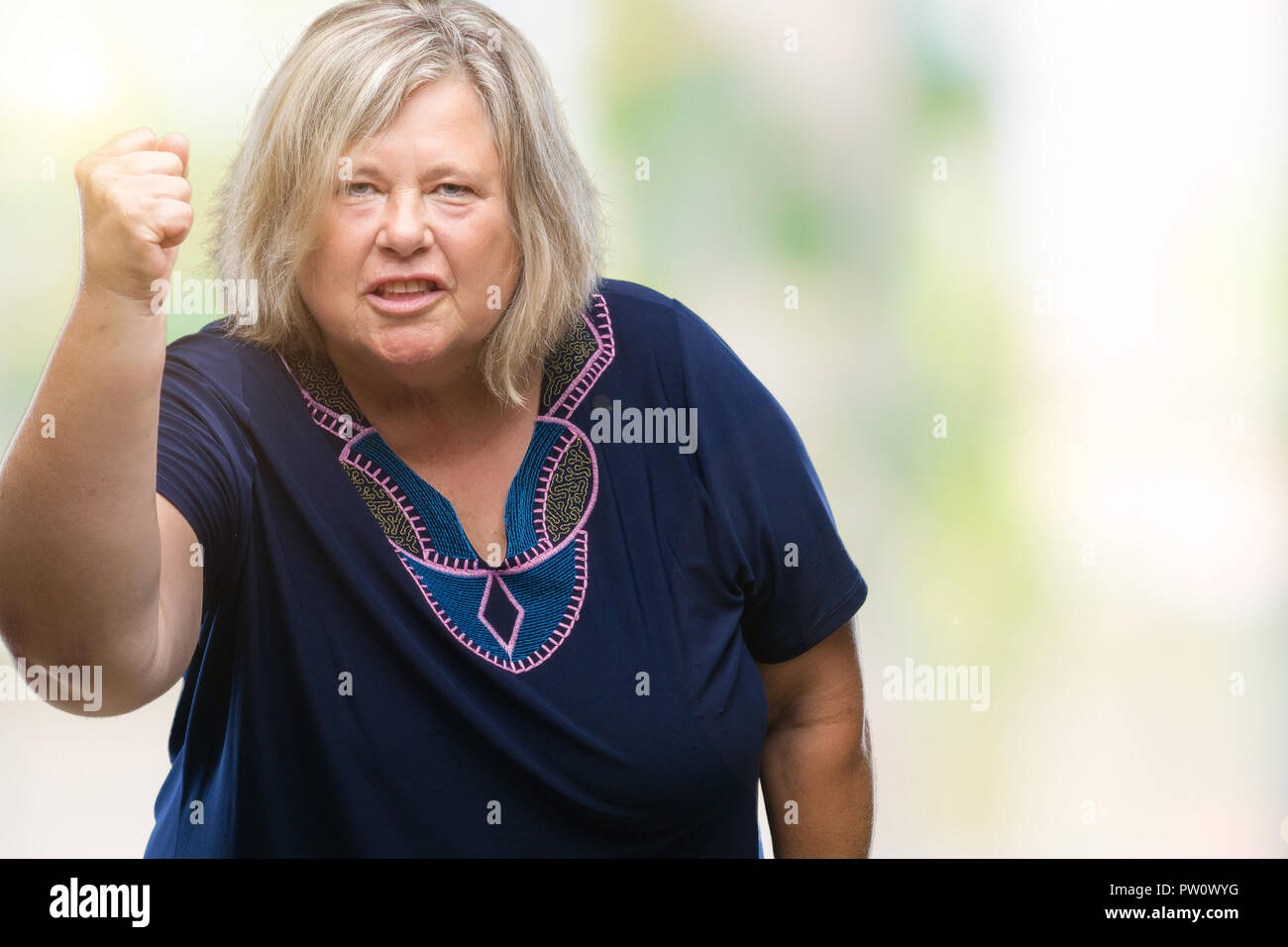 Senior plus size caucasian woman over isolated background angry and mad ...