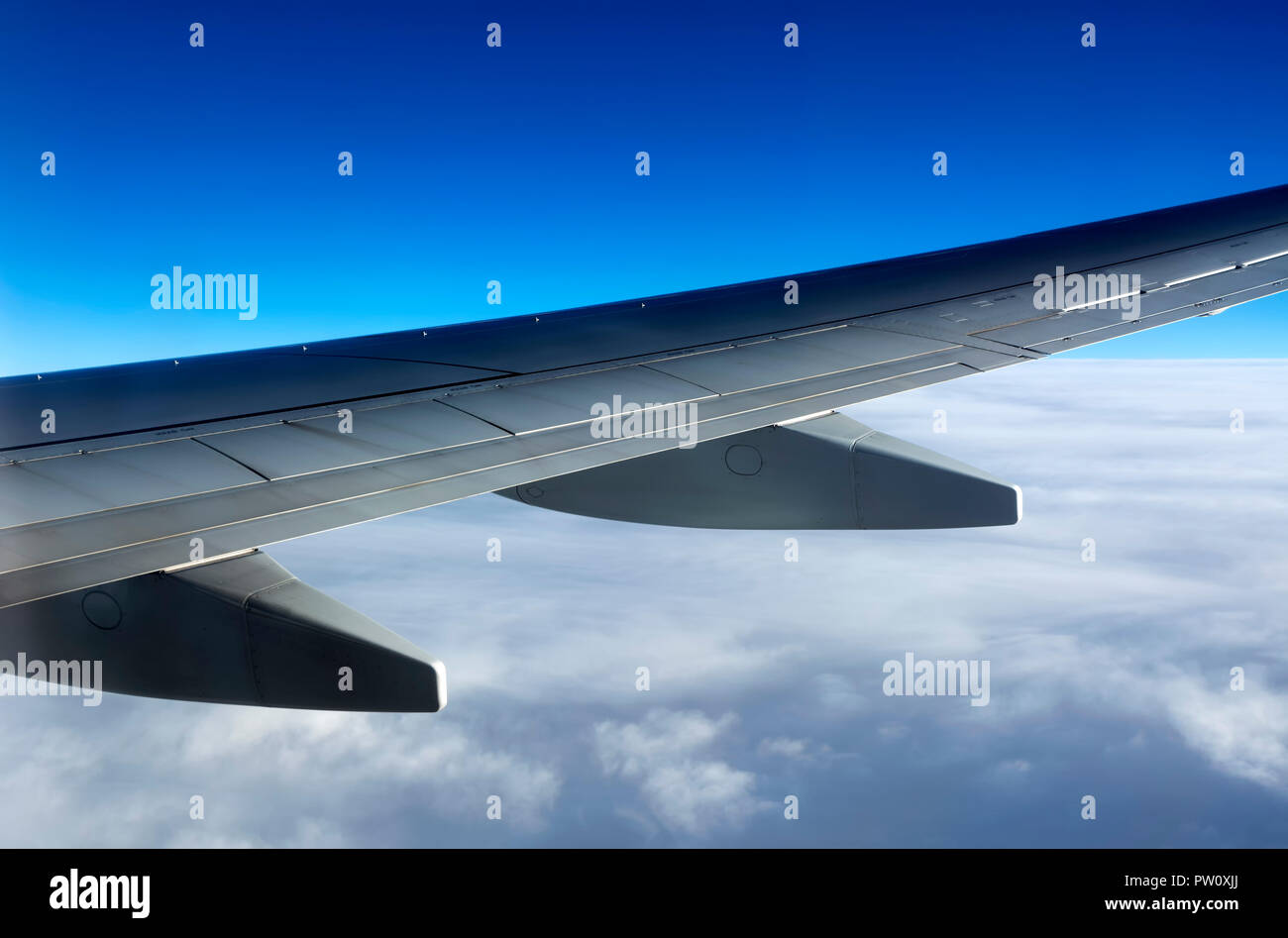 Airplane wing before landing Stock Photo - Alamy