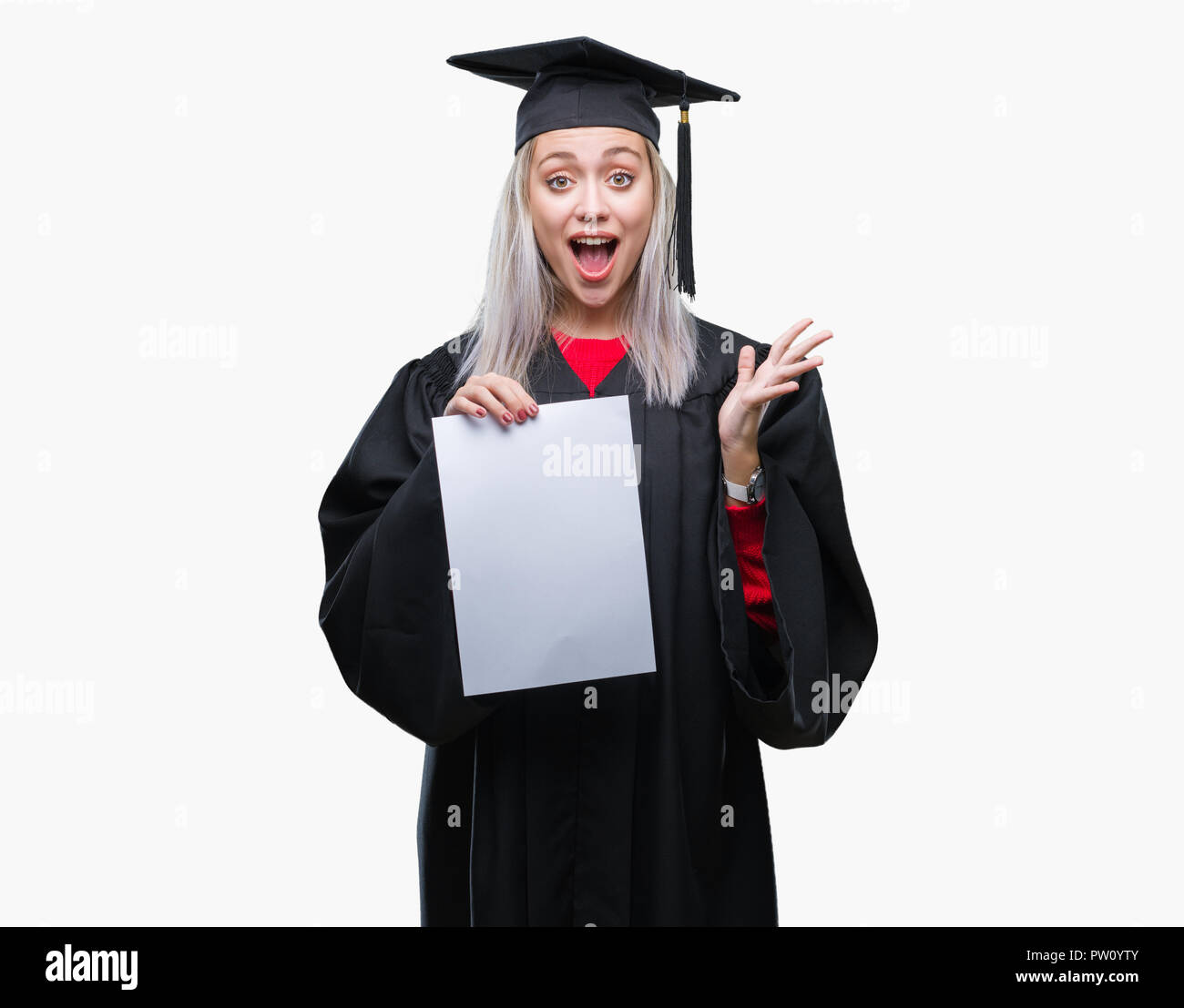 Young blonde woman wearing graduate uniform holding degree over ...