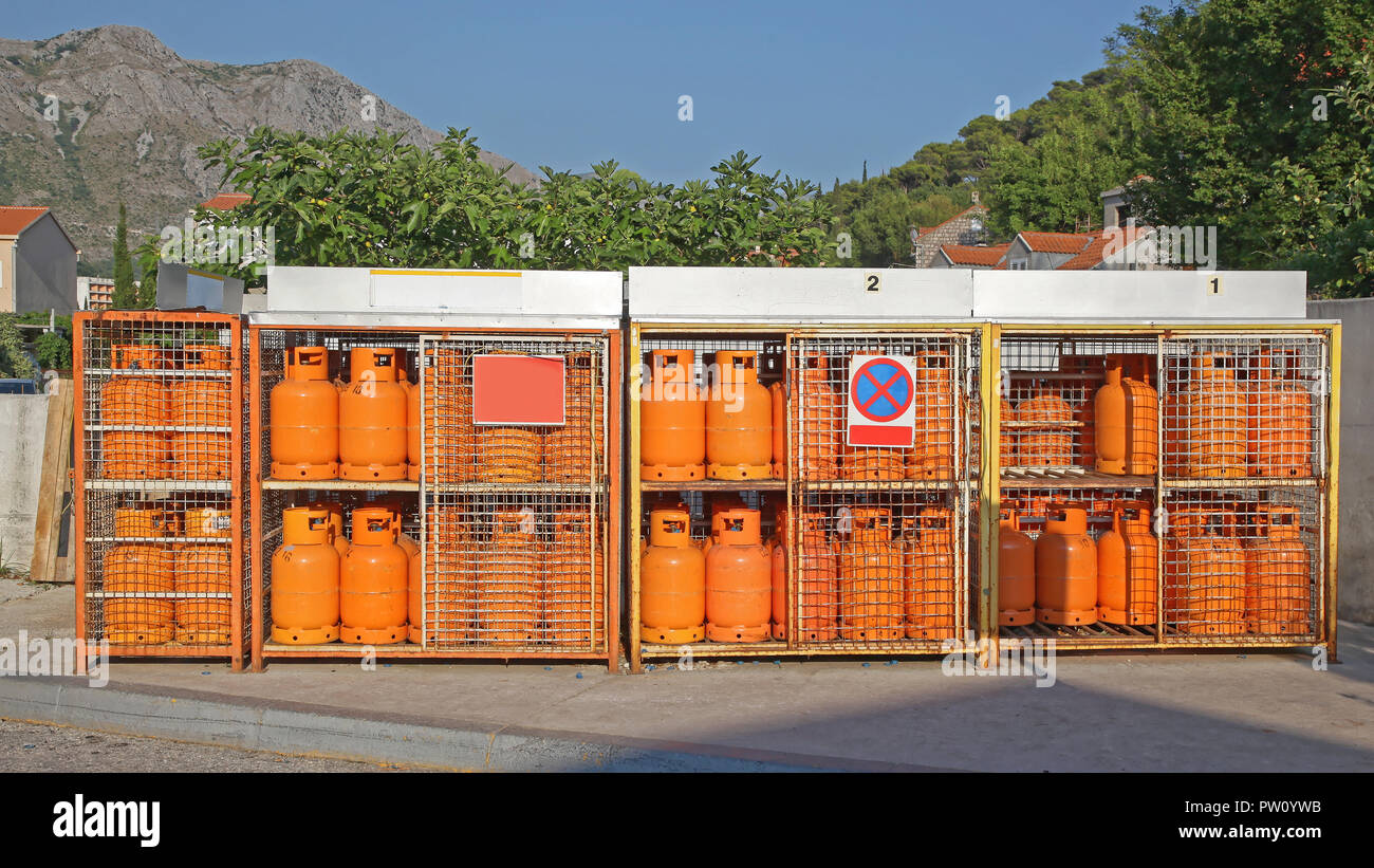 Gas Cylinder Bottles at Fuel Station Warehouse Stock Photo - Alamy