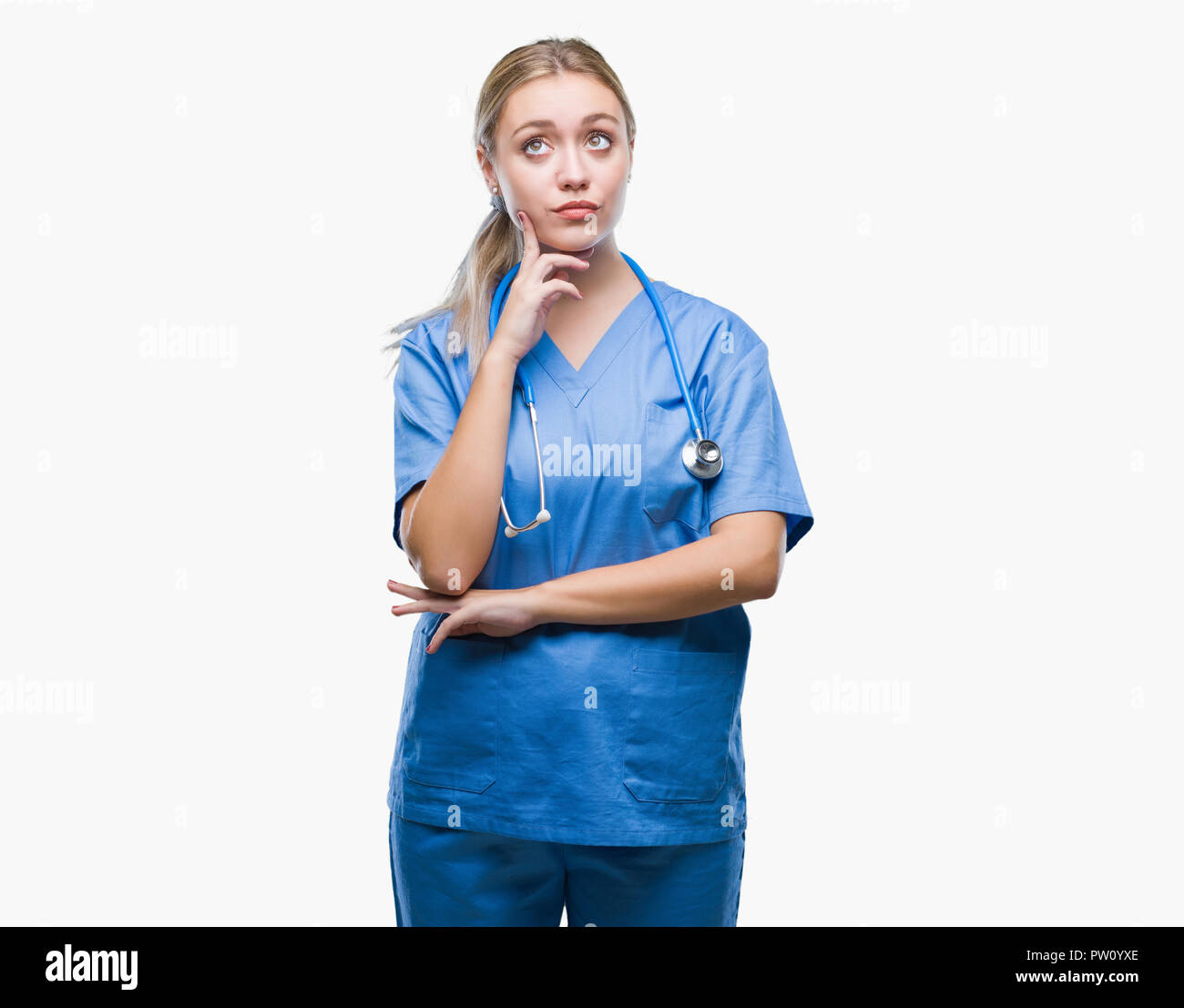 Young blonde surgeon doctor woman over isolated background with hand on ...