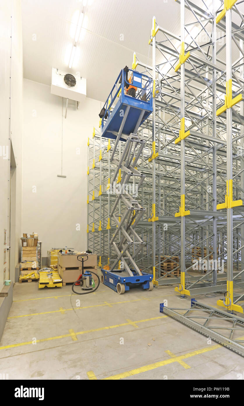 Scissor Lift at Construction Site in Distribution Warehouse Stock Photo ...