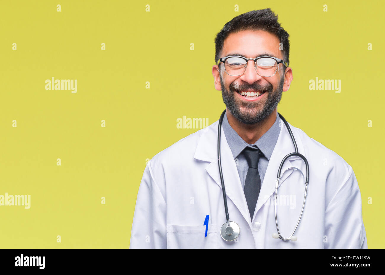 Adult hispanic doctor man over isolated background with a happy and ...