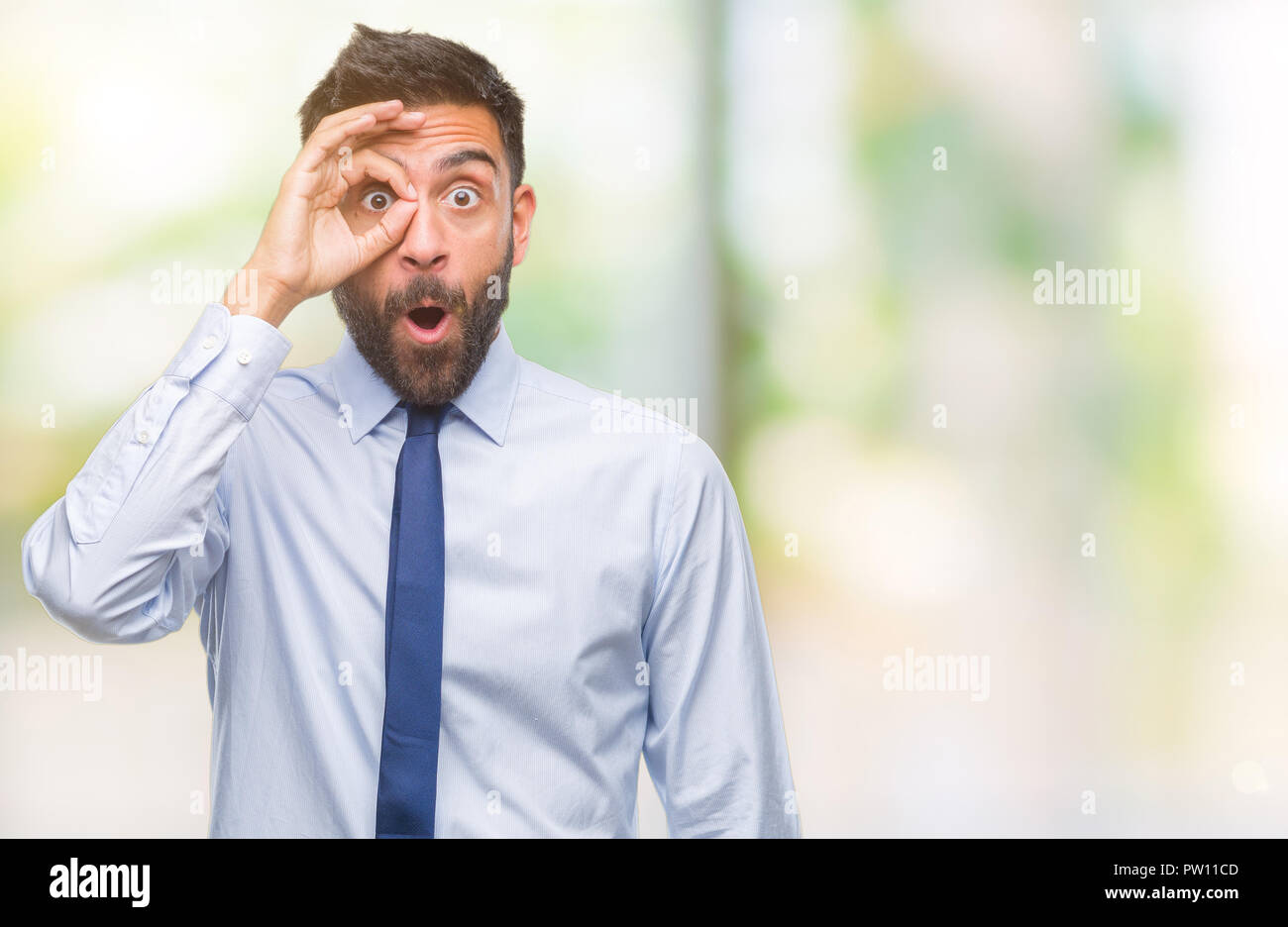 Adult hispanic business man over isolated background doing ok gesture ...