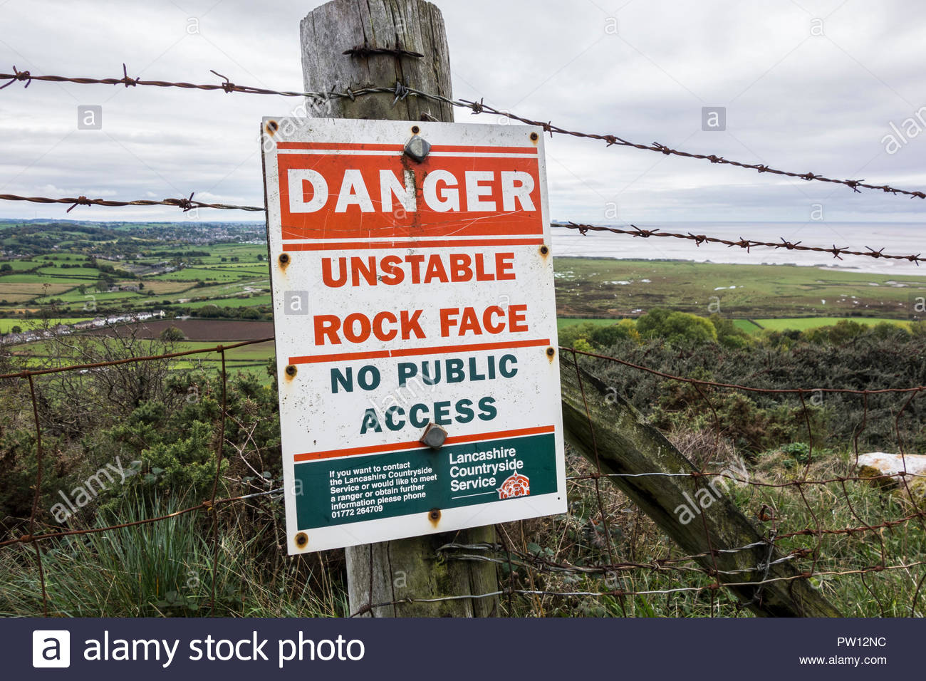 Danger Unstable Rock Face Sign Stock Photos & Danger Unstable Rock Face ...