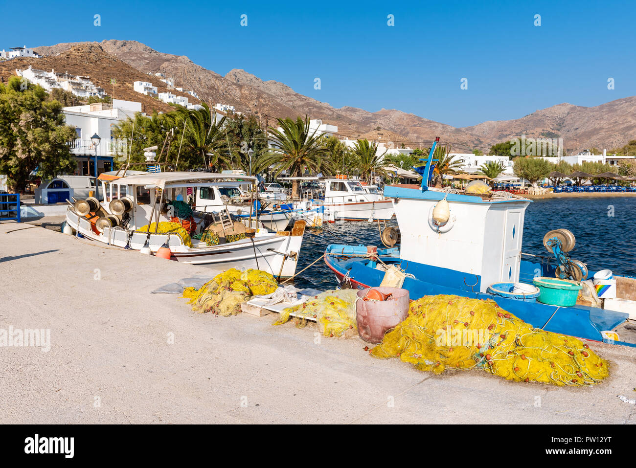 Fishing boats with fishnets in the port of Livadi. Serifos island ...